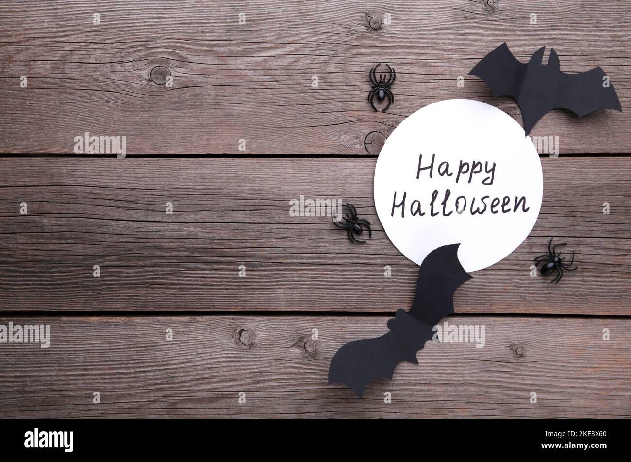 Halloween paper decorations on grey wooden background. Halloween ...
