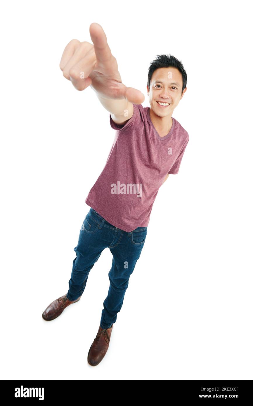 Pointing you in the right direction. Tilted studio portrait of a young ...