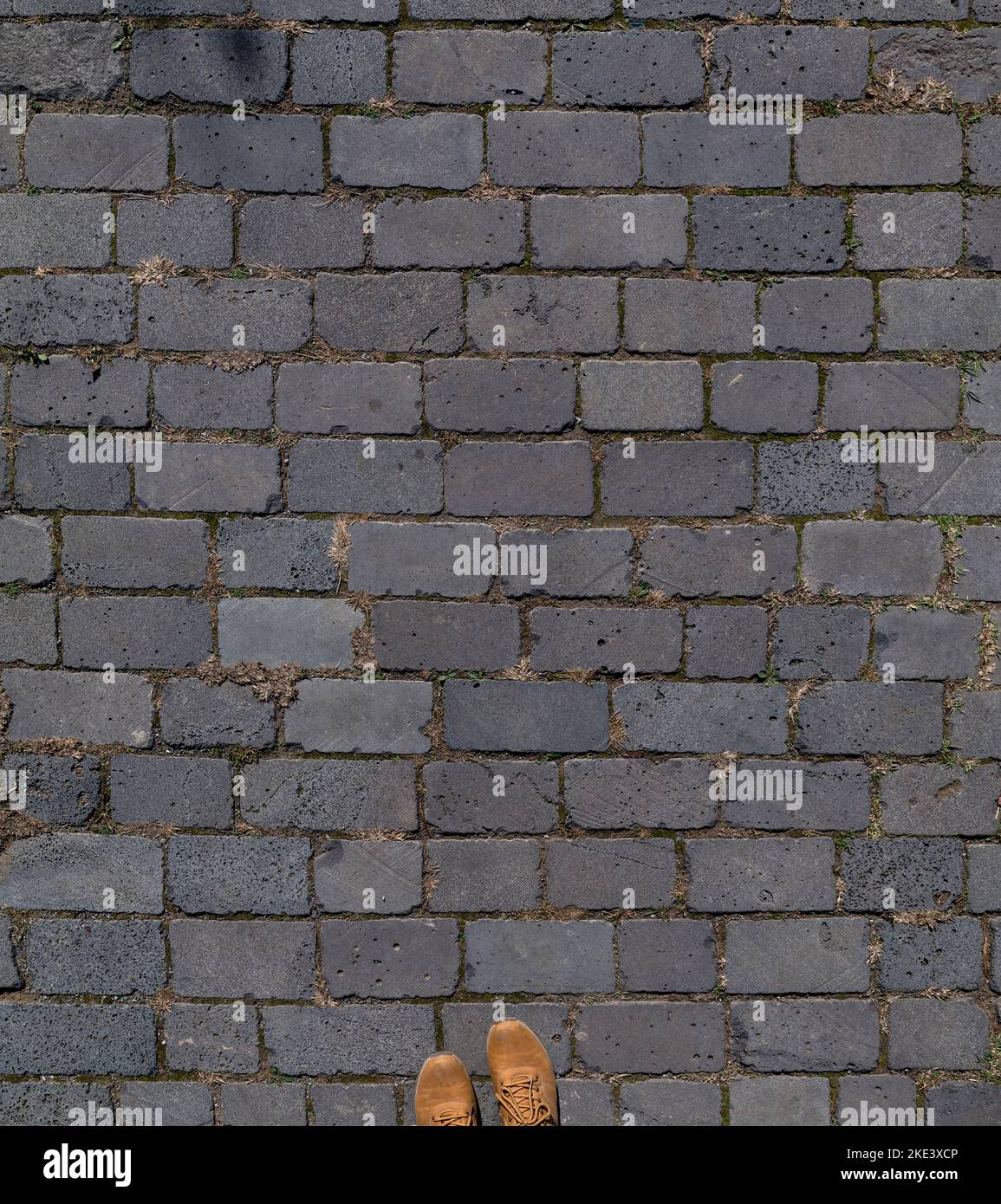 Old paving slabs with shoes Stock Photo - Alamy