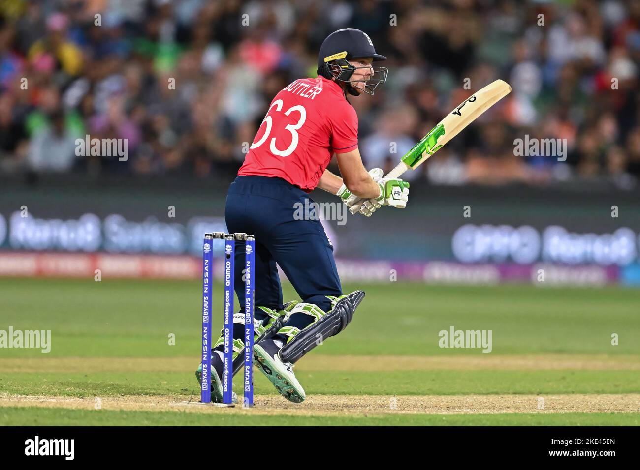 Jos Buttler (C) of England play shot between the wicket during the ICC ...