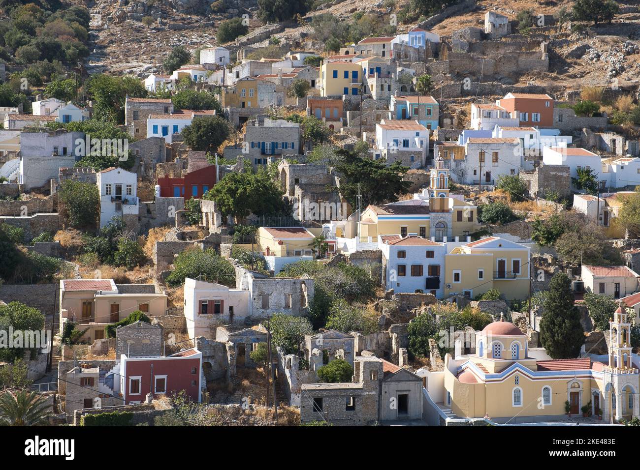 An aerial view of buildings in Symi village on Symi island, Greece ...