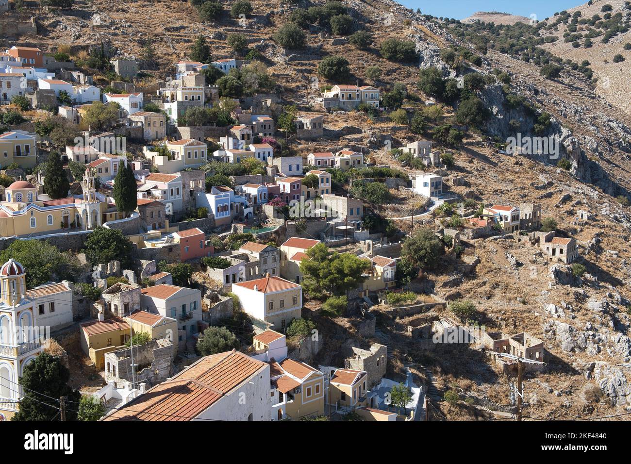 An aerial view of buildings in Symi village on Symi island, Greece ...