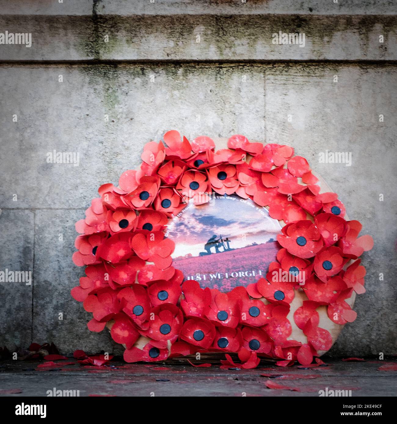 Remembrance Day poppy wreaths laid on the steps of the war memorial in ...