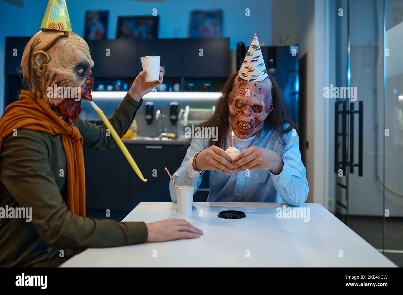 Zombie employees congratulate colleague with birthday Stock Photo - Alamy