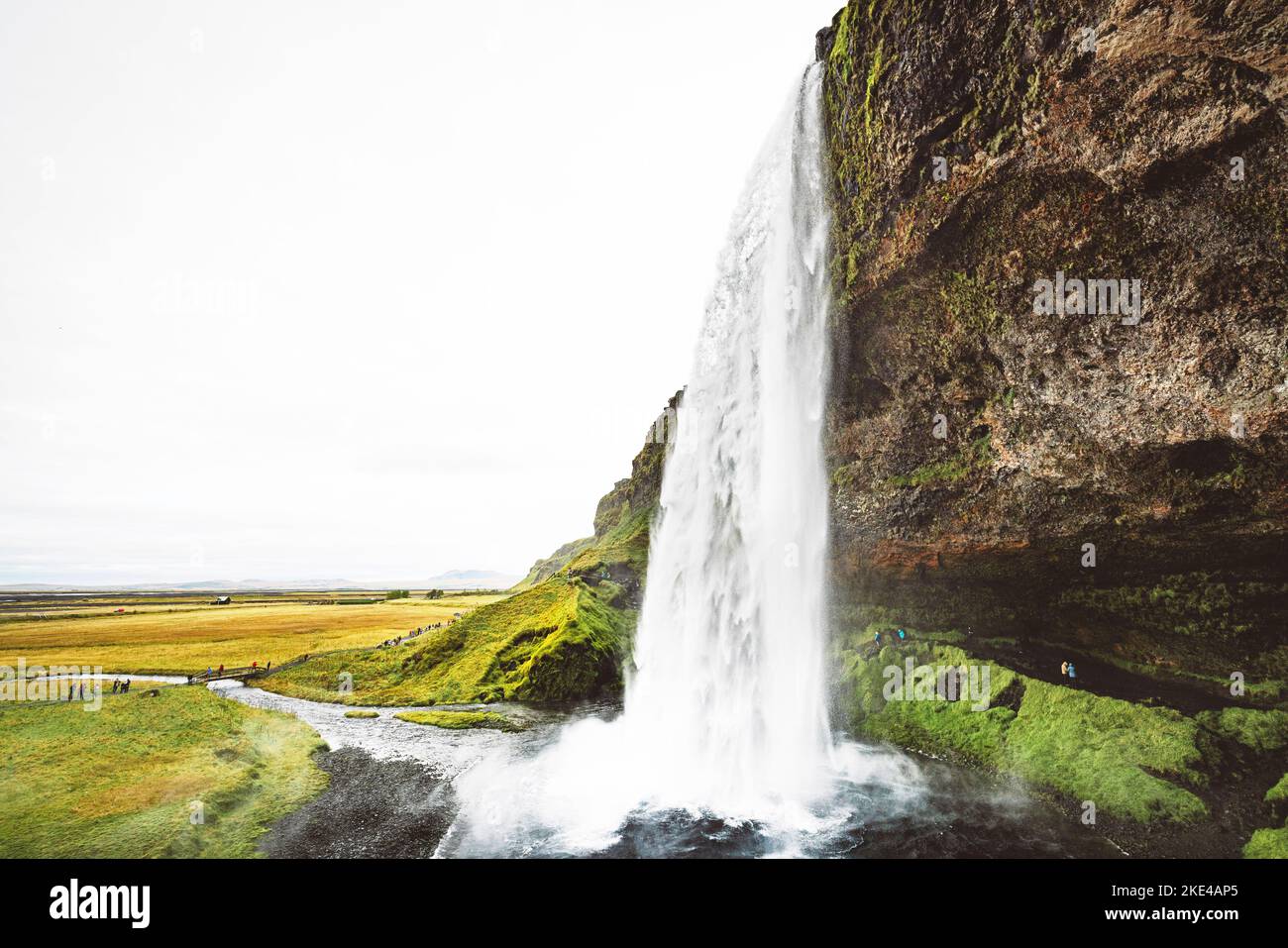Water falling over the rock formation - Seljalandsfoss, Gljufrabui ...