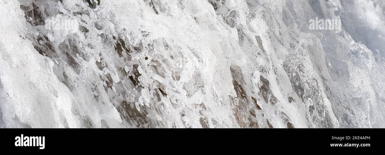 Frozen ice stalagmite in snow with ice in cave Stock Photo - Alamy