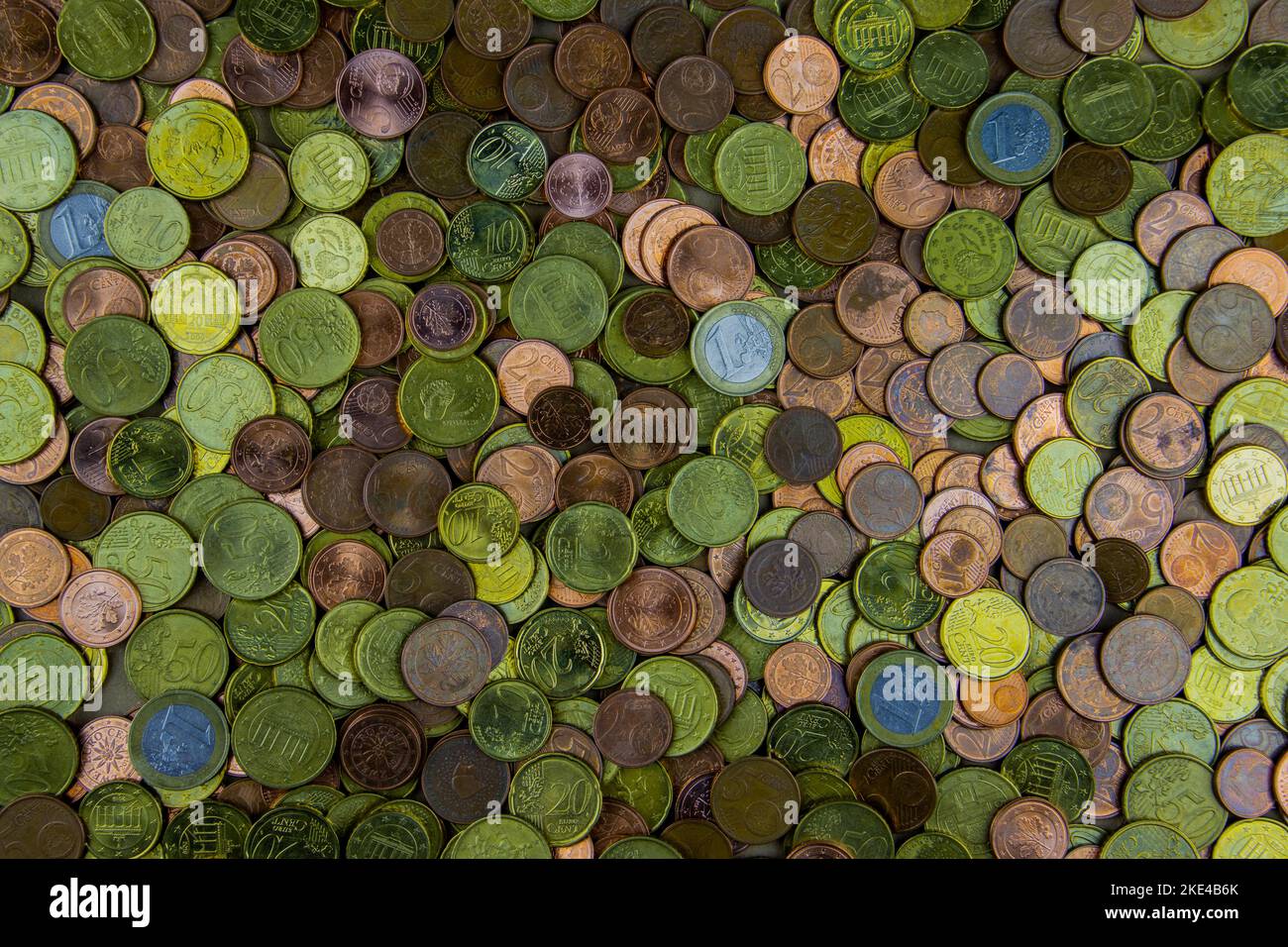 Many euro coins for financial background Stock Photo - Alamy