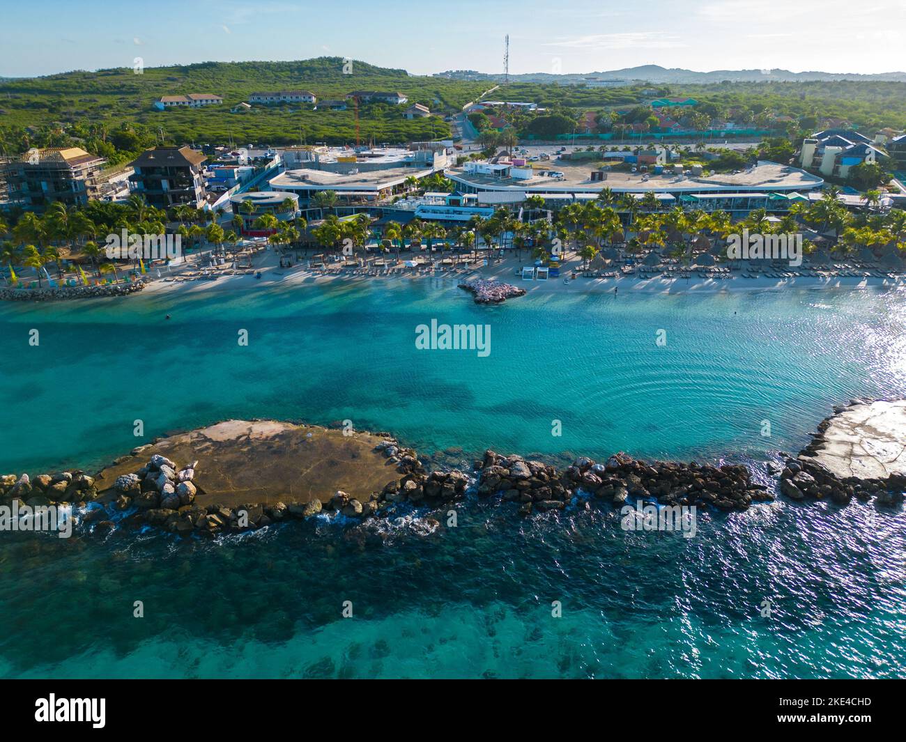 An aerial of the blue ocean and the beautiful Mambo beach in Curacao on ...
