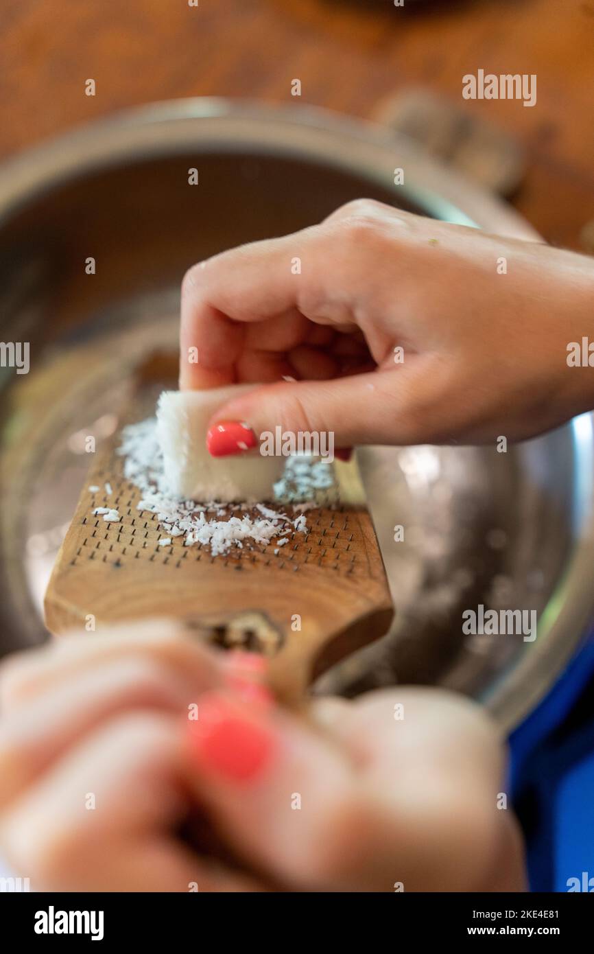 Grating coconut hi-res stock photography and images - Alamy