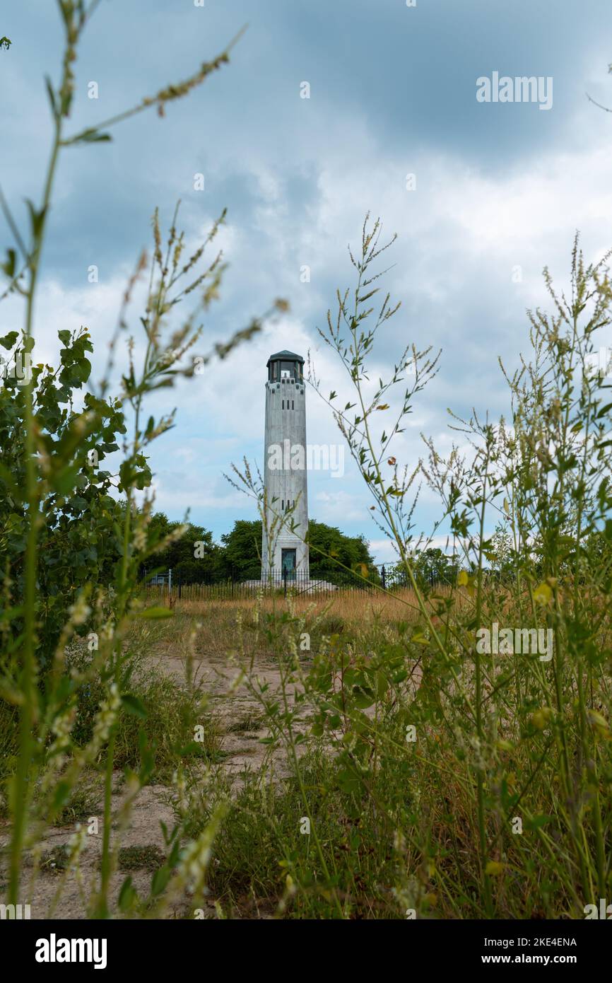A vertical shot of the Livingstone Memorial Lighthouse captured through ...