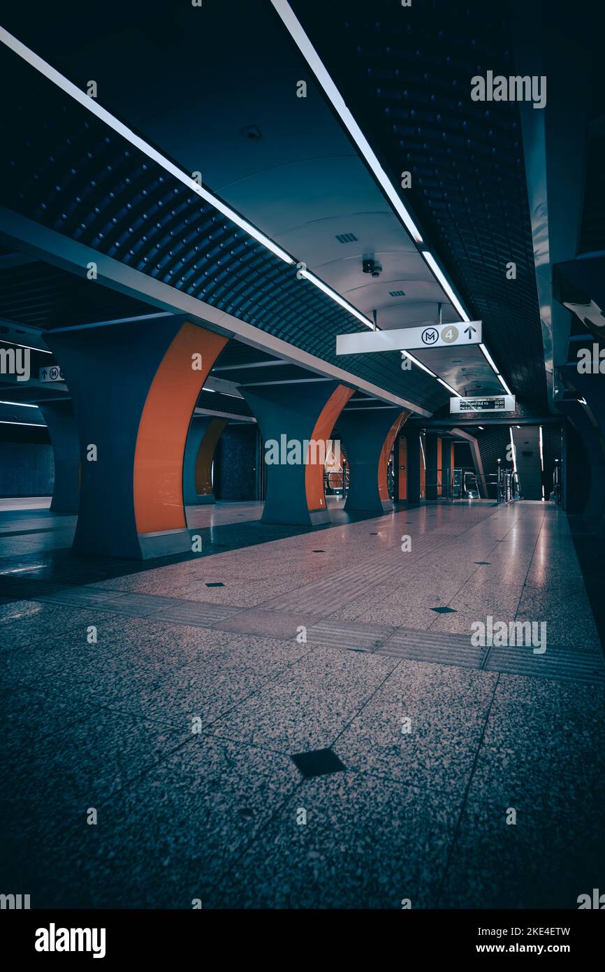 A vertical dramatic view of a modern underground station Stock Photo ...