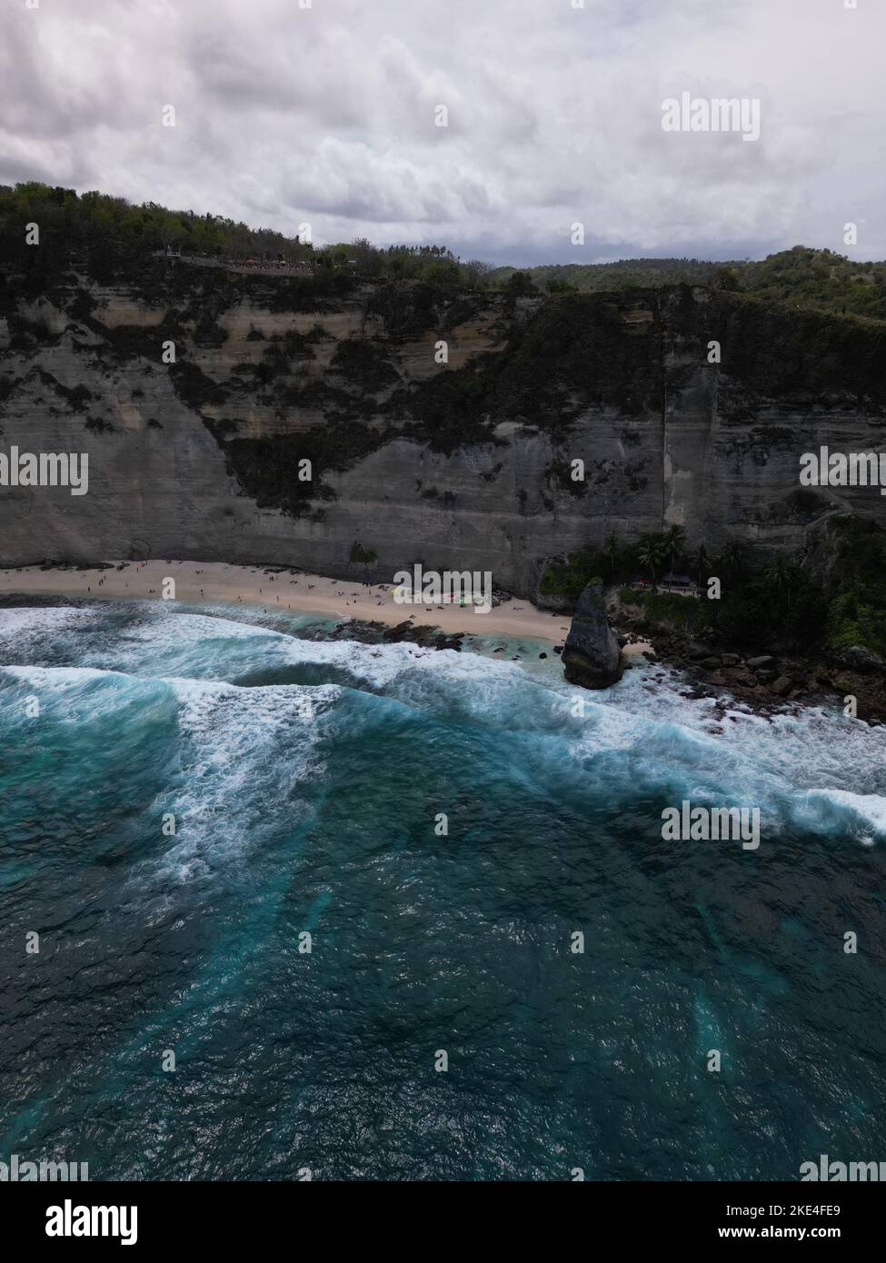 A vertical bird's eye view of a seacoast surrounded by cliffs Stock ...