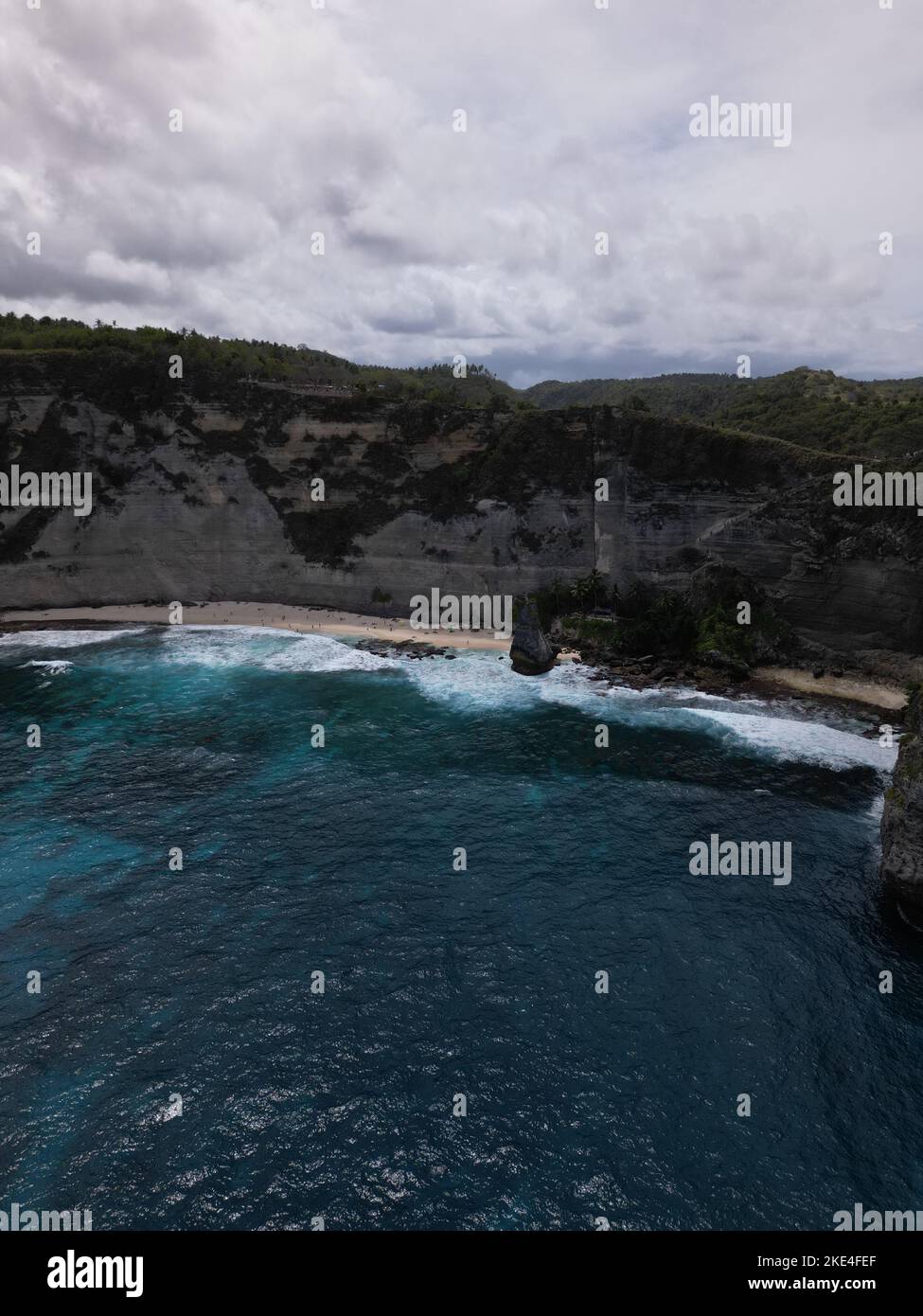 A vertical bird's eye view of a seacoast surrounded by cliffs Stock ...