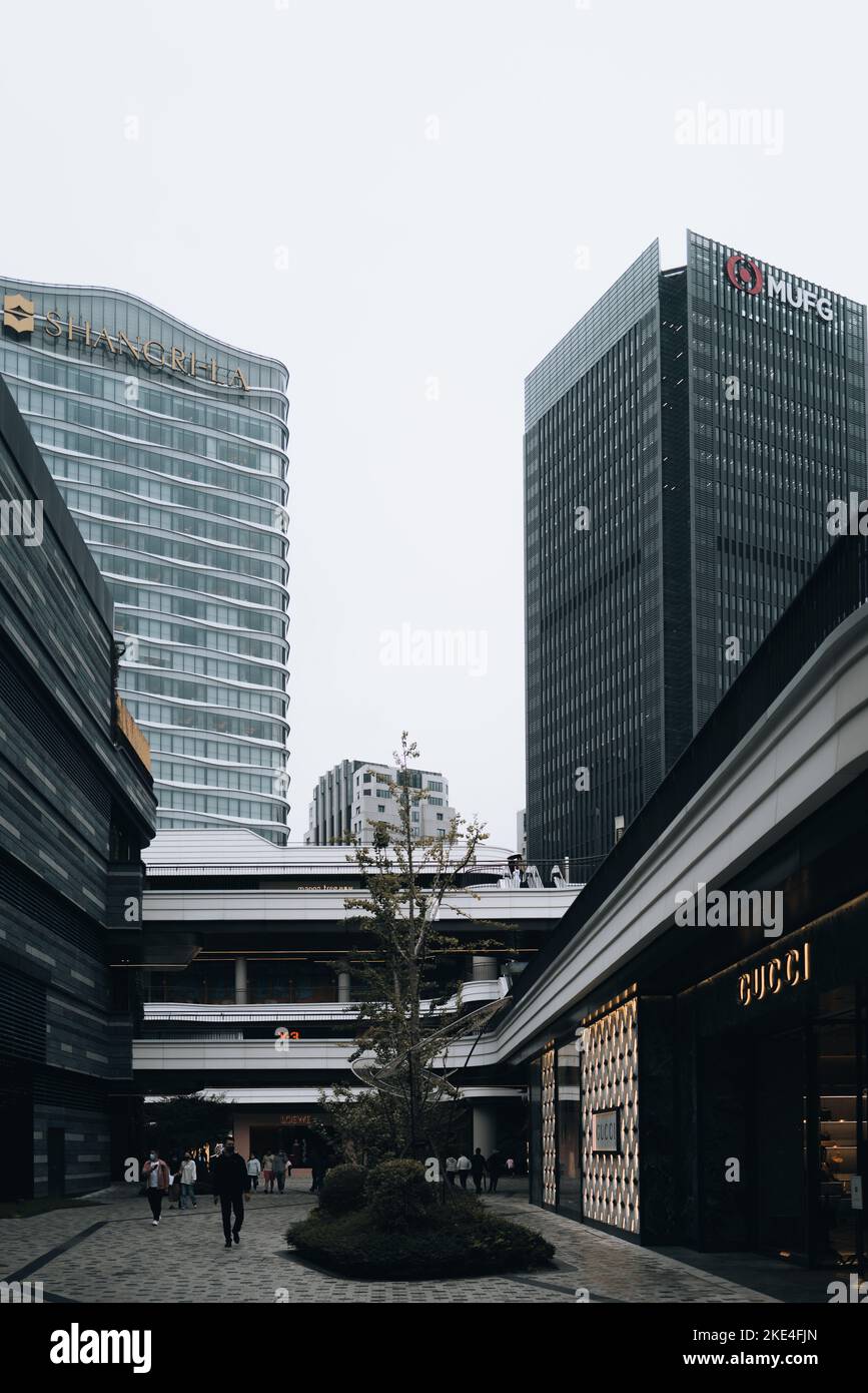 A vertical shot of shopping malls in Pudong, Shanghai Stock Photo - Alamy