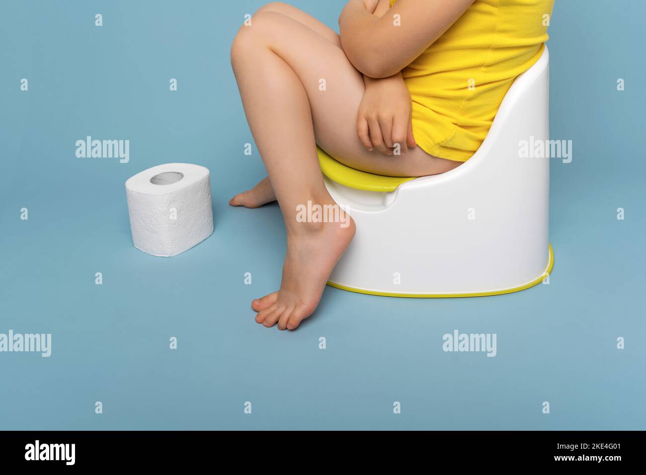 Baby on the potty, stomach pain Stock Photo - Alamy