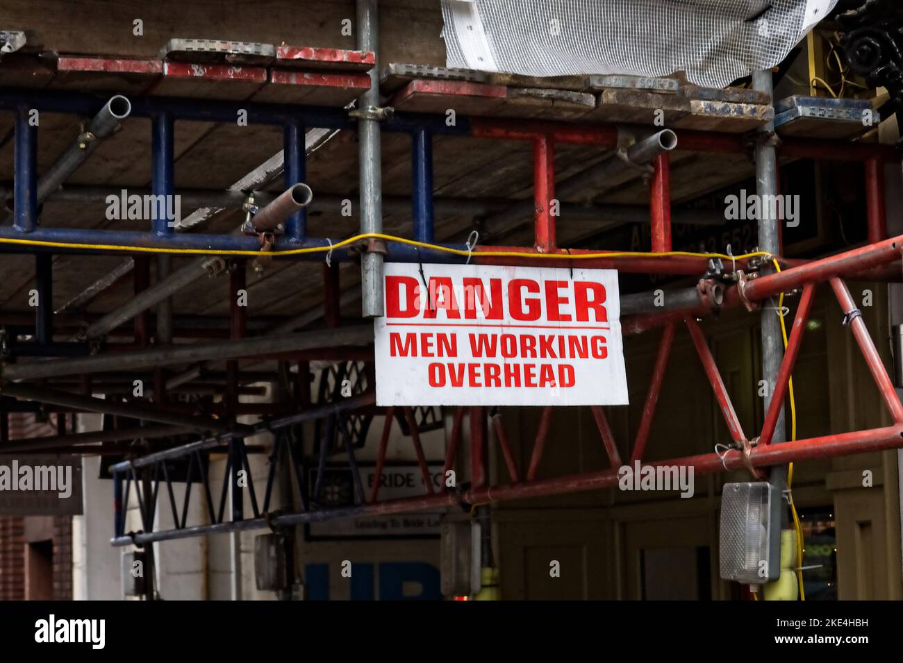 A "Danger, men working overhead" sign at the construction site Stock ...