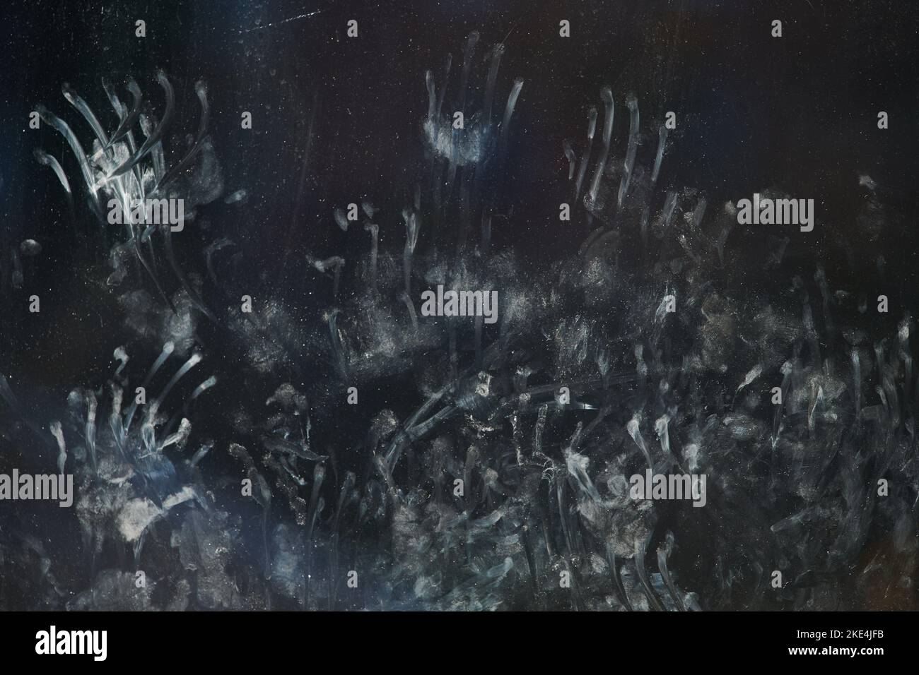 The spooky hand prints on the window glass Stock Photo - Alamy