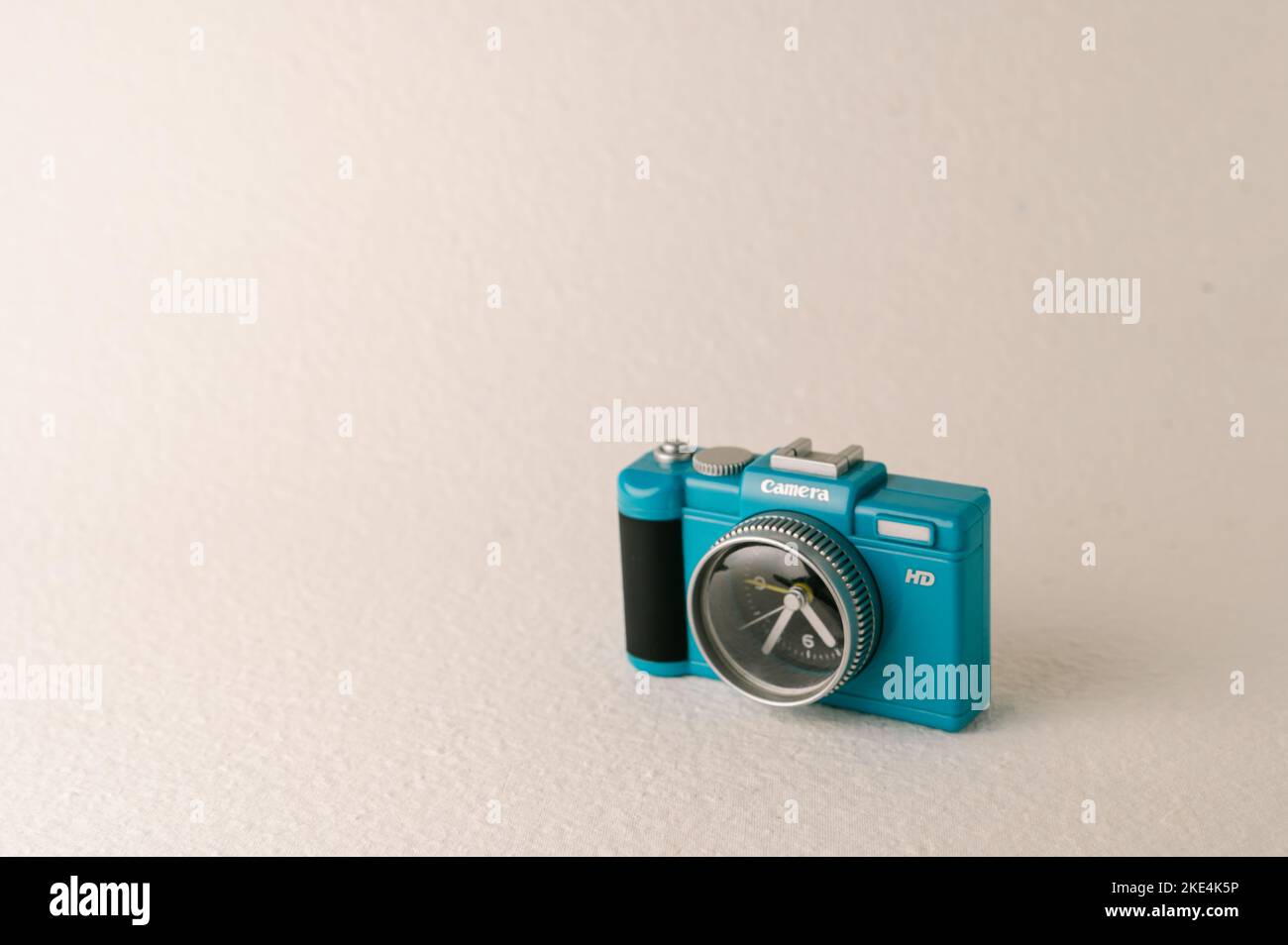 Blue old photo camera clock Stock Photo - Alamy