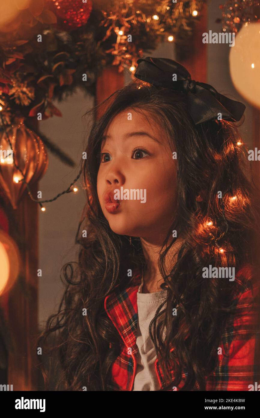 Happy japan little girl dreamer waiting miracle from Santa posing on ...