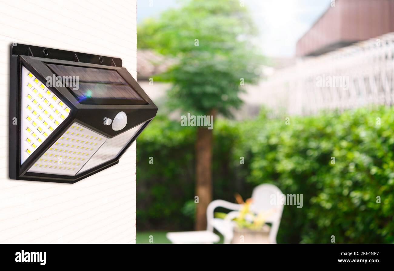 Small solar powered led light with motion sensor Stock Photo - Alamy