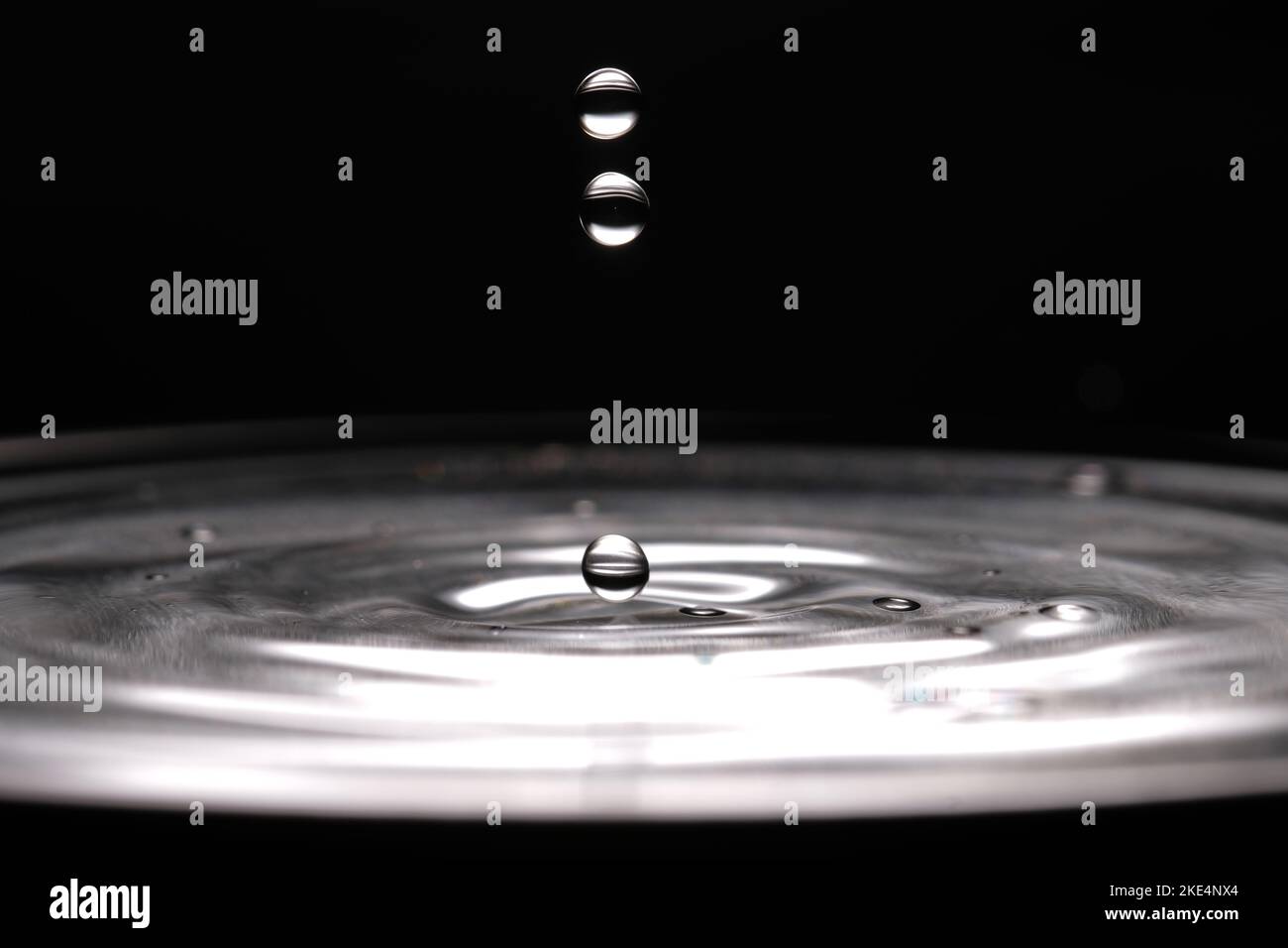 A Macro shot of splashing water drop, grayscale shot Stock Photo - Alamy