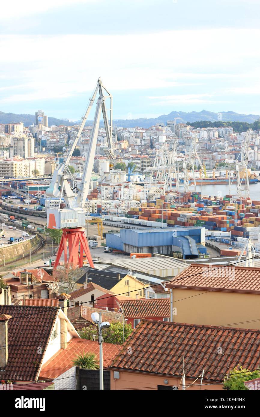 A vertical shot of a loading and unloading crane for cargo containers ...