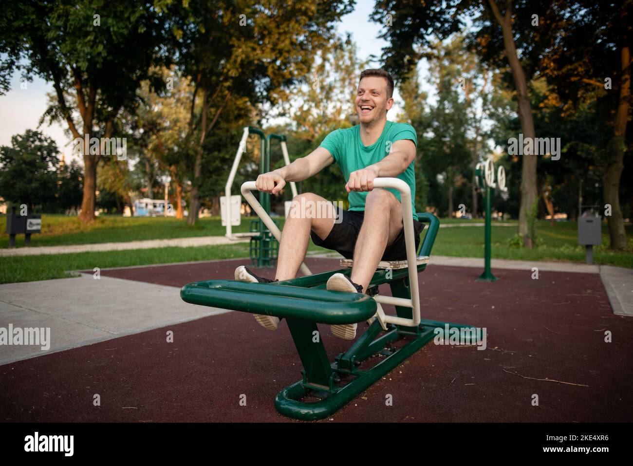 Male on rowing machine hi-res stock photography and images - Alamy