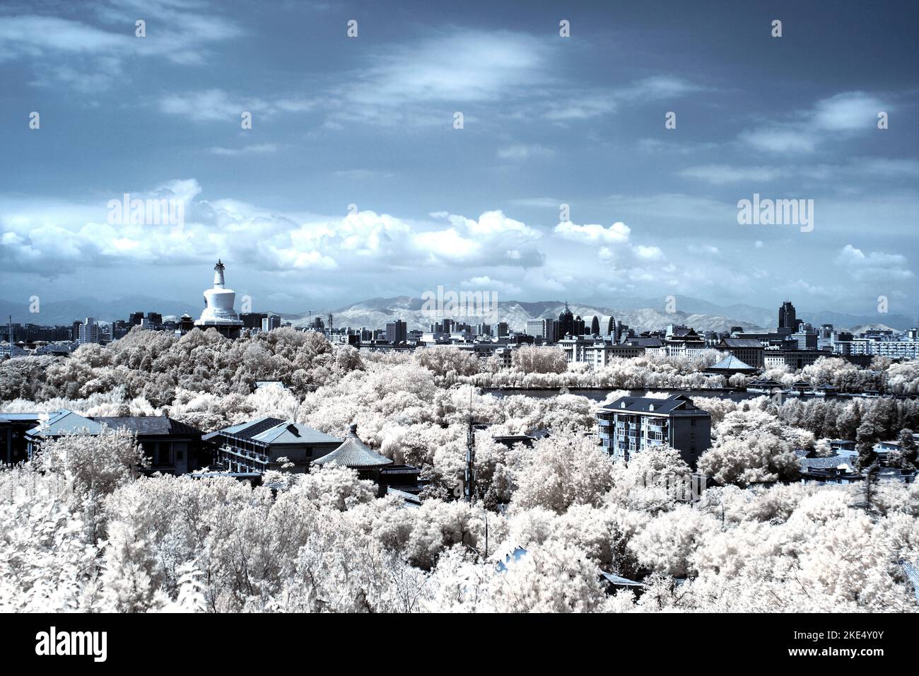 A beautiful view of buildings and trees with a sky in the background in ...