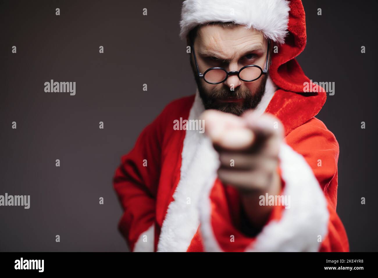 Santa Claus gesturing with finger Stock Photo - Alamy