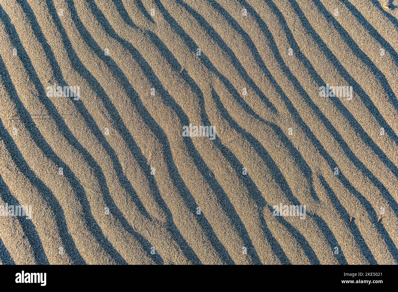 A sand texture with natural wind trails Stock Photo - Alamy