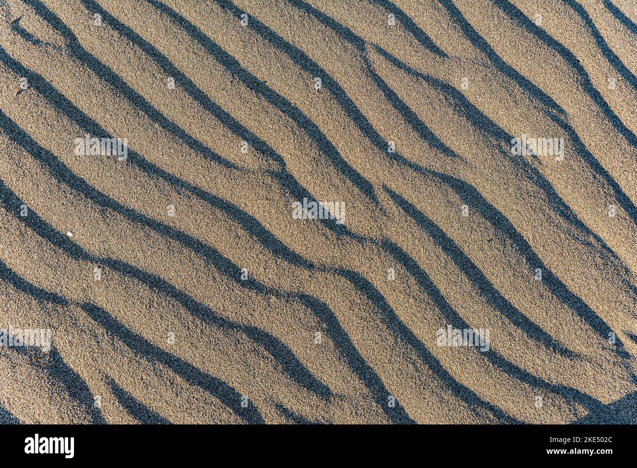 A sand texture with natural wind trails Stock Photo - Alamy
