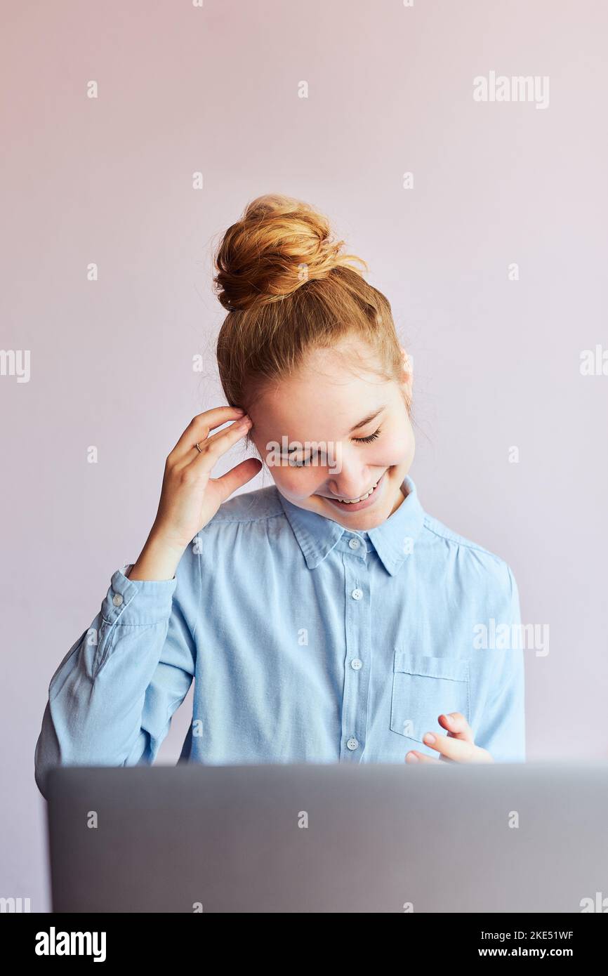 Young woman student having classes, learning online, watching lesson ...