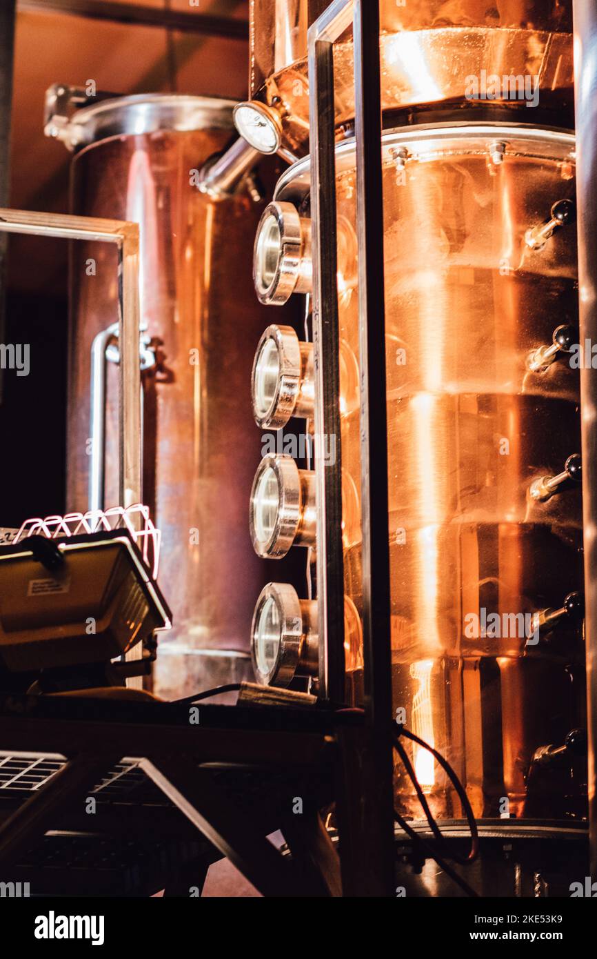 construction lights highlighting copper columns with bubble plates at ...