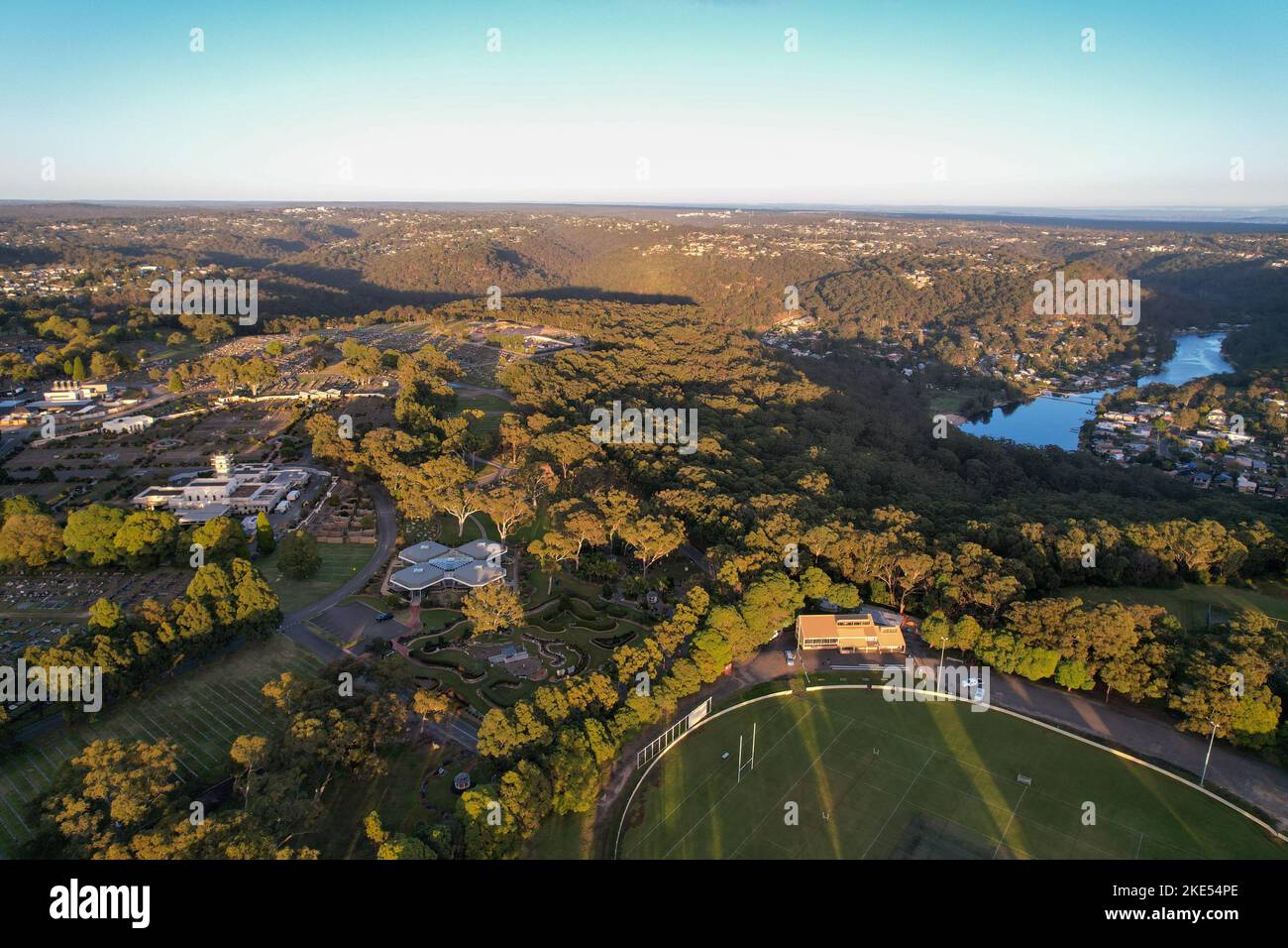 Aerial view of sporting ground, Sutherland Oval, Woronora River and ...