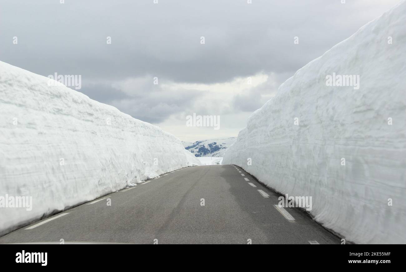 Road running in a tunnel of snow Stock Photo - Alamy