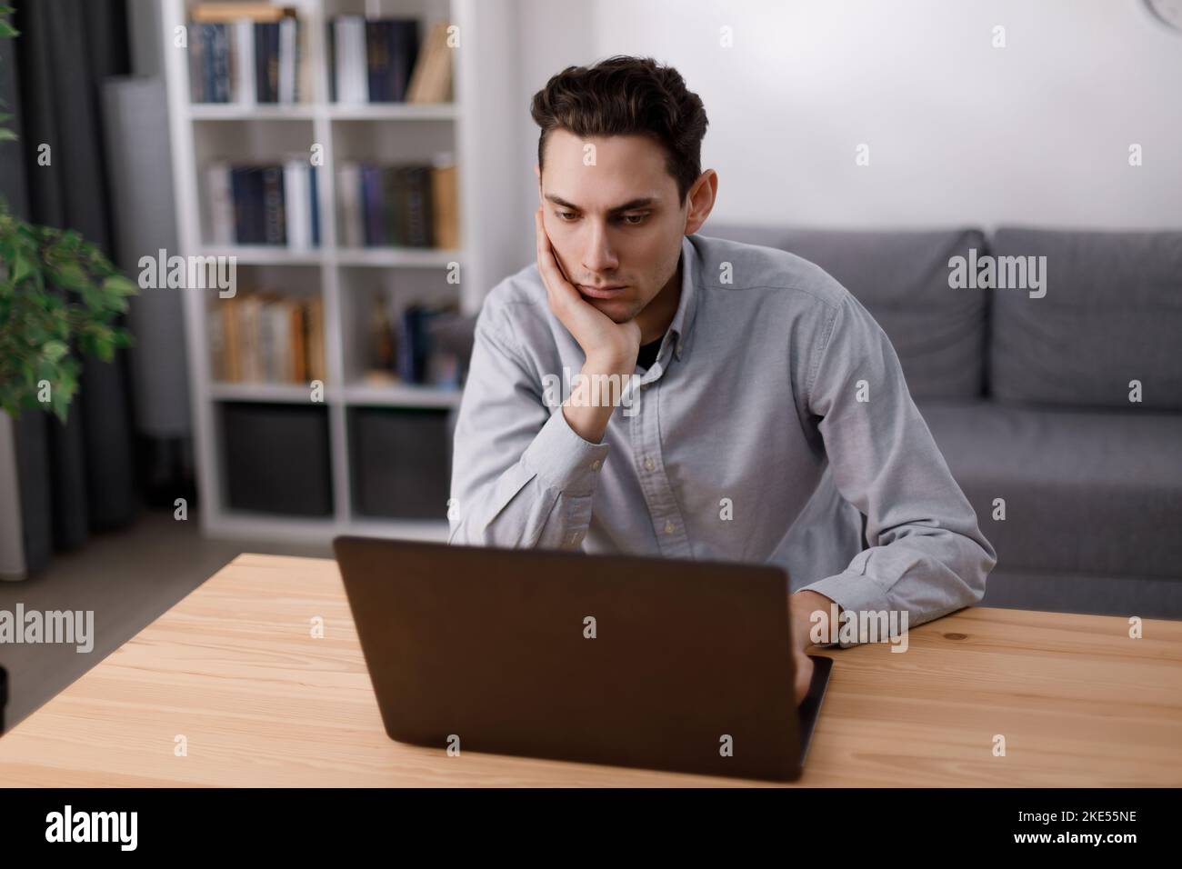 Handsome focused guy working hi-res stock photography and images - Alamy