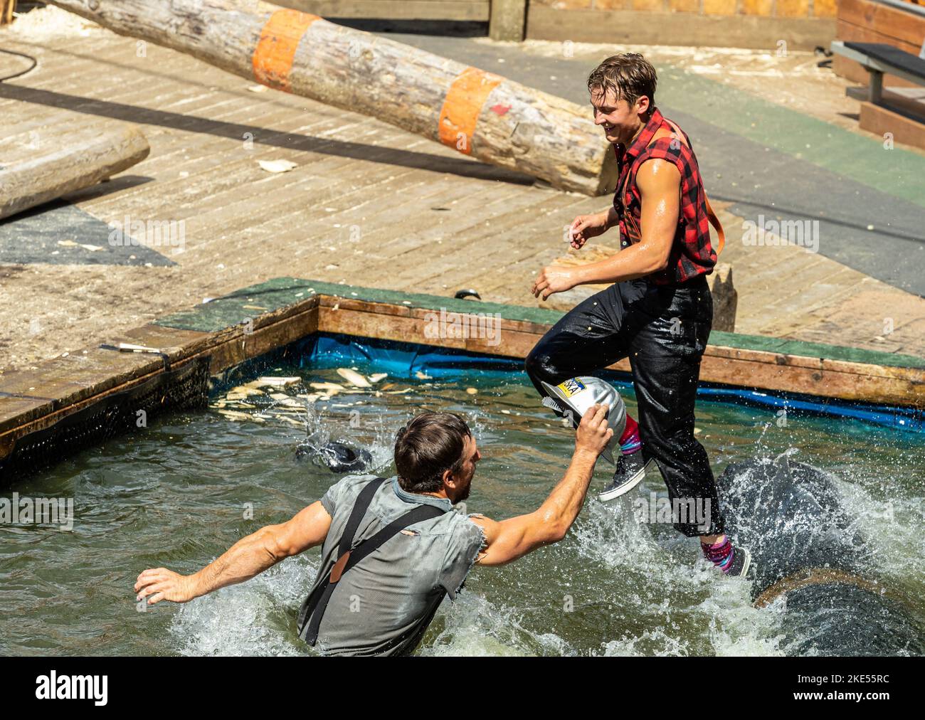 The two young guys performing the Lumberjack show in water, Ketchikan ...