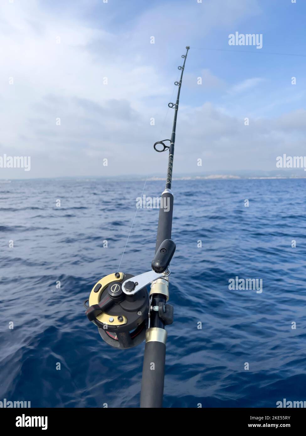 Fishing rod and reel anchored to the ship looking for a big catching in ...