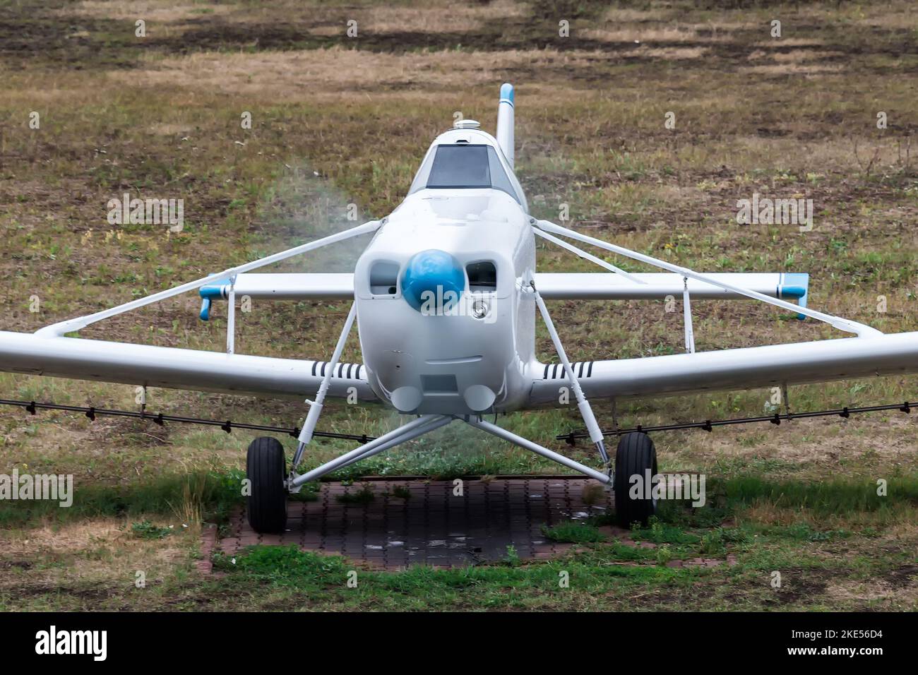 Close-up white airplane for spraying agricultural fields at the ...