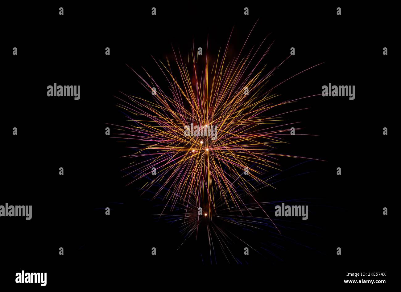 Colorful fireworks explosion in the night sky, captured with long ...