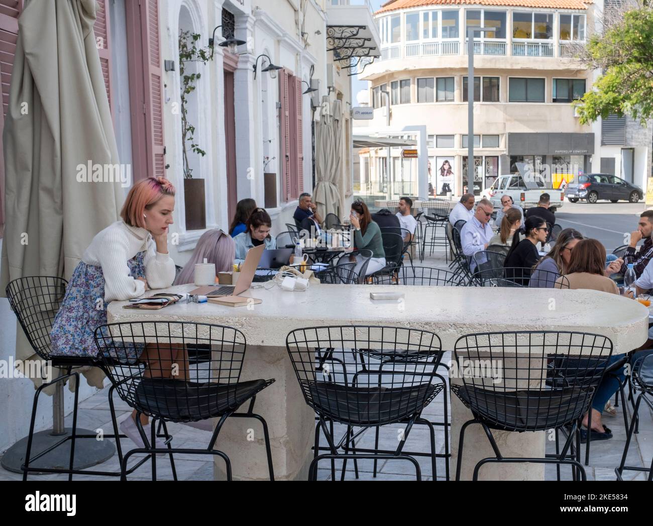 Cafe's in Martiou 25 street, Paphos old town, Cyprus Stock Photo - Alamy