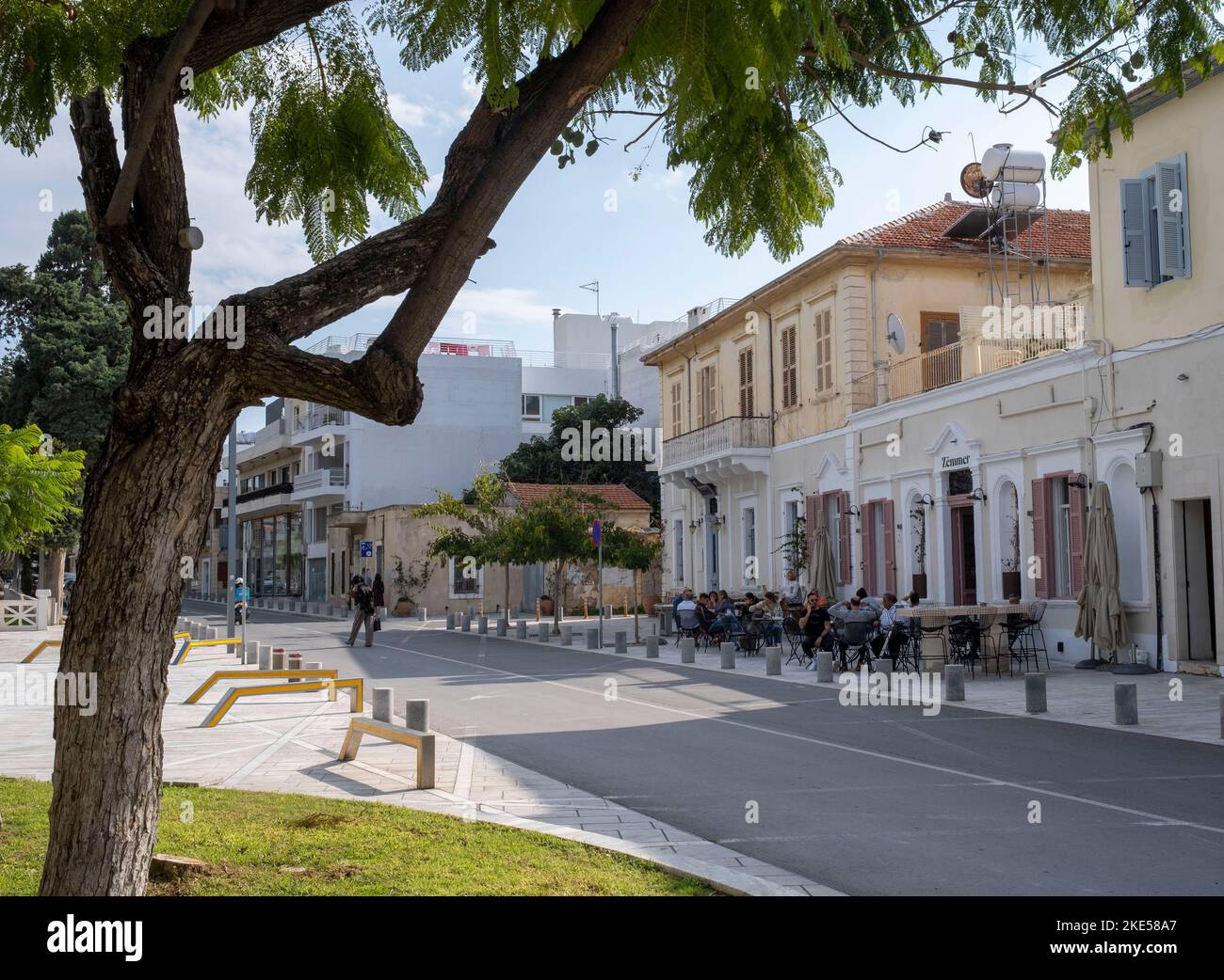 Cafe's in Martiou 25 street, Paphos old town, Cyprus Stock Photo - Alamy