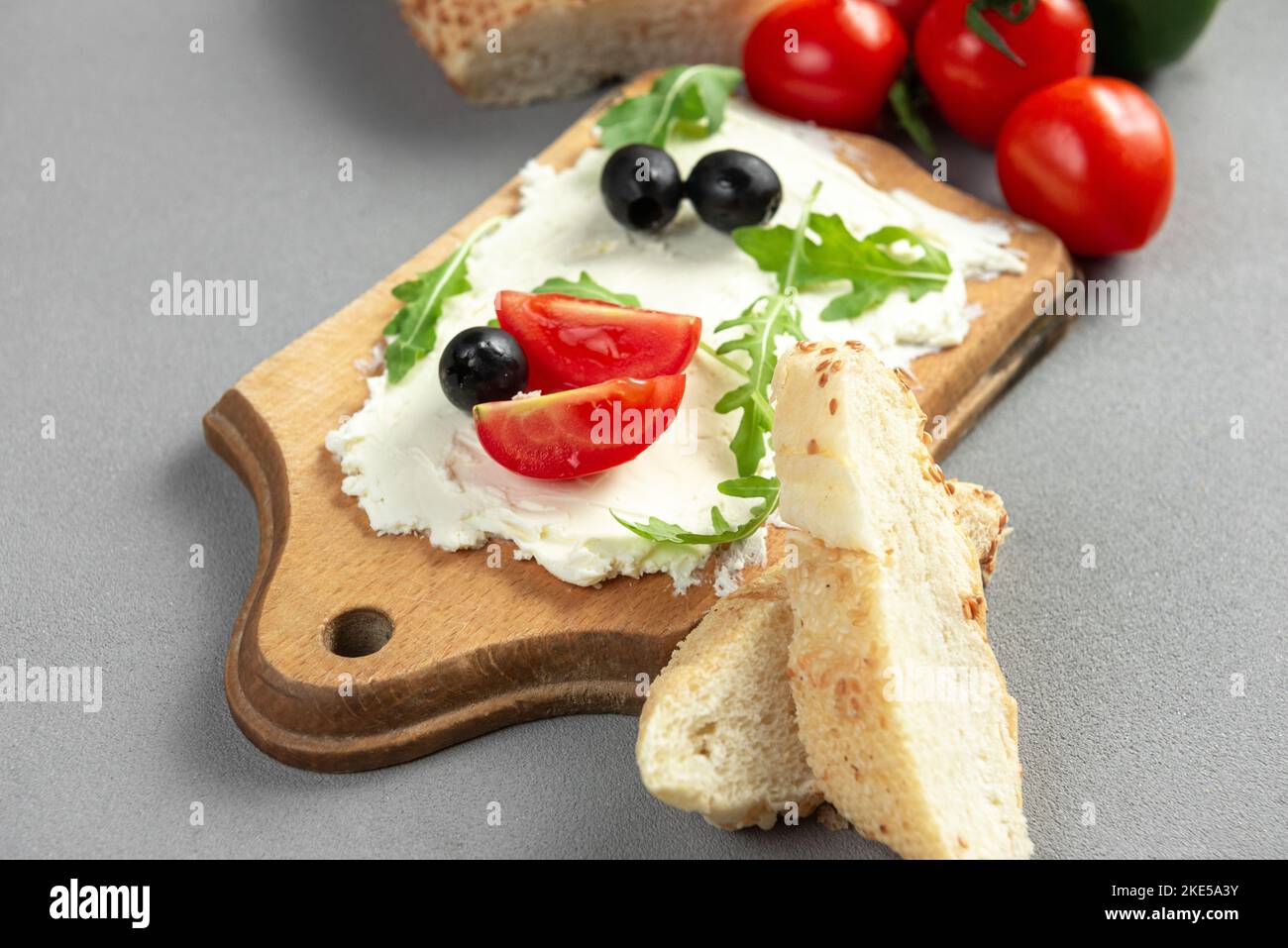 A food trend, bread with butter and toppings. Board with butter snack ...