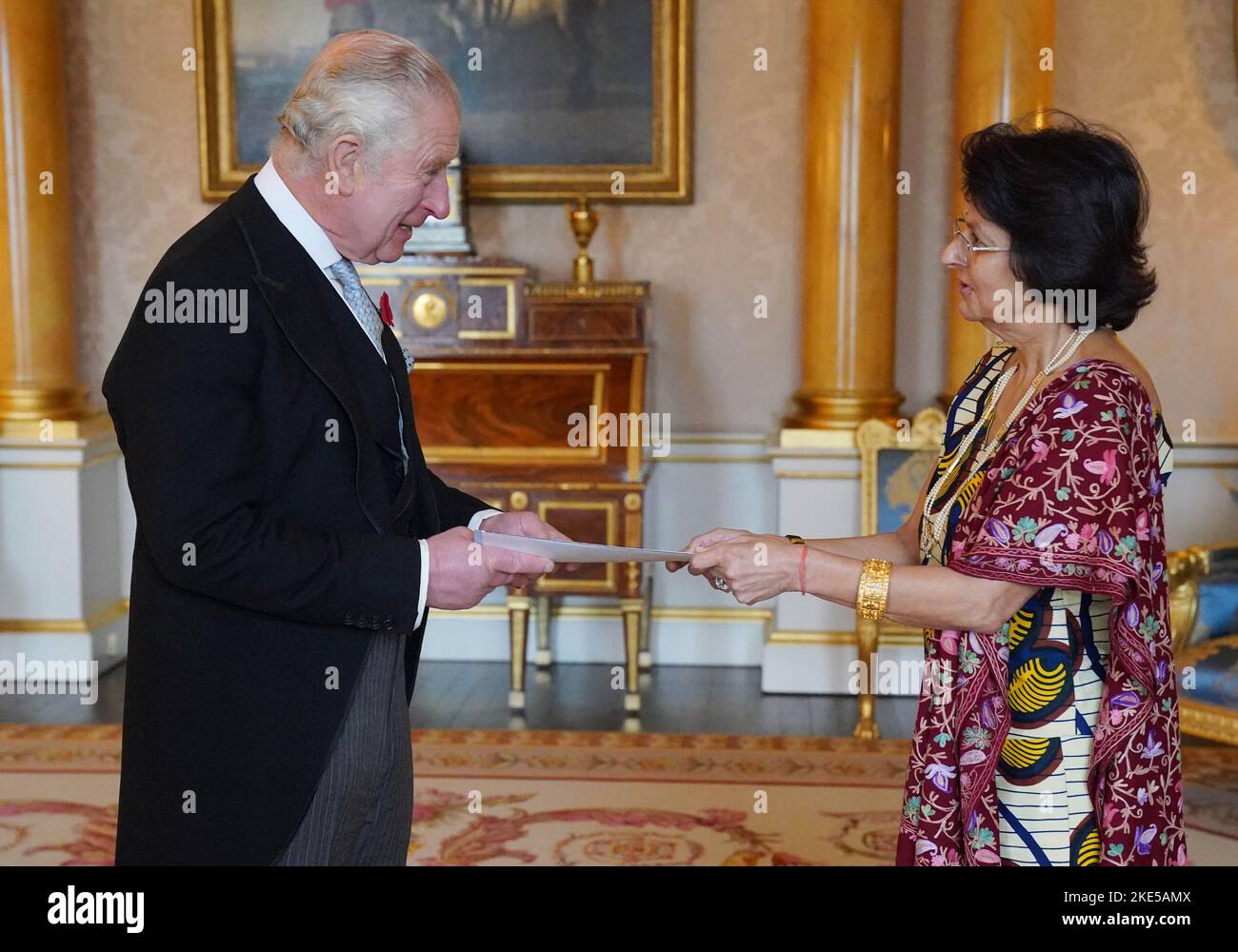 King Charles III (left) receives Her Excellency Nimisha Madhvani (right ...