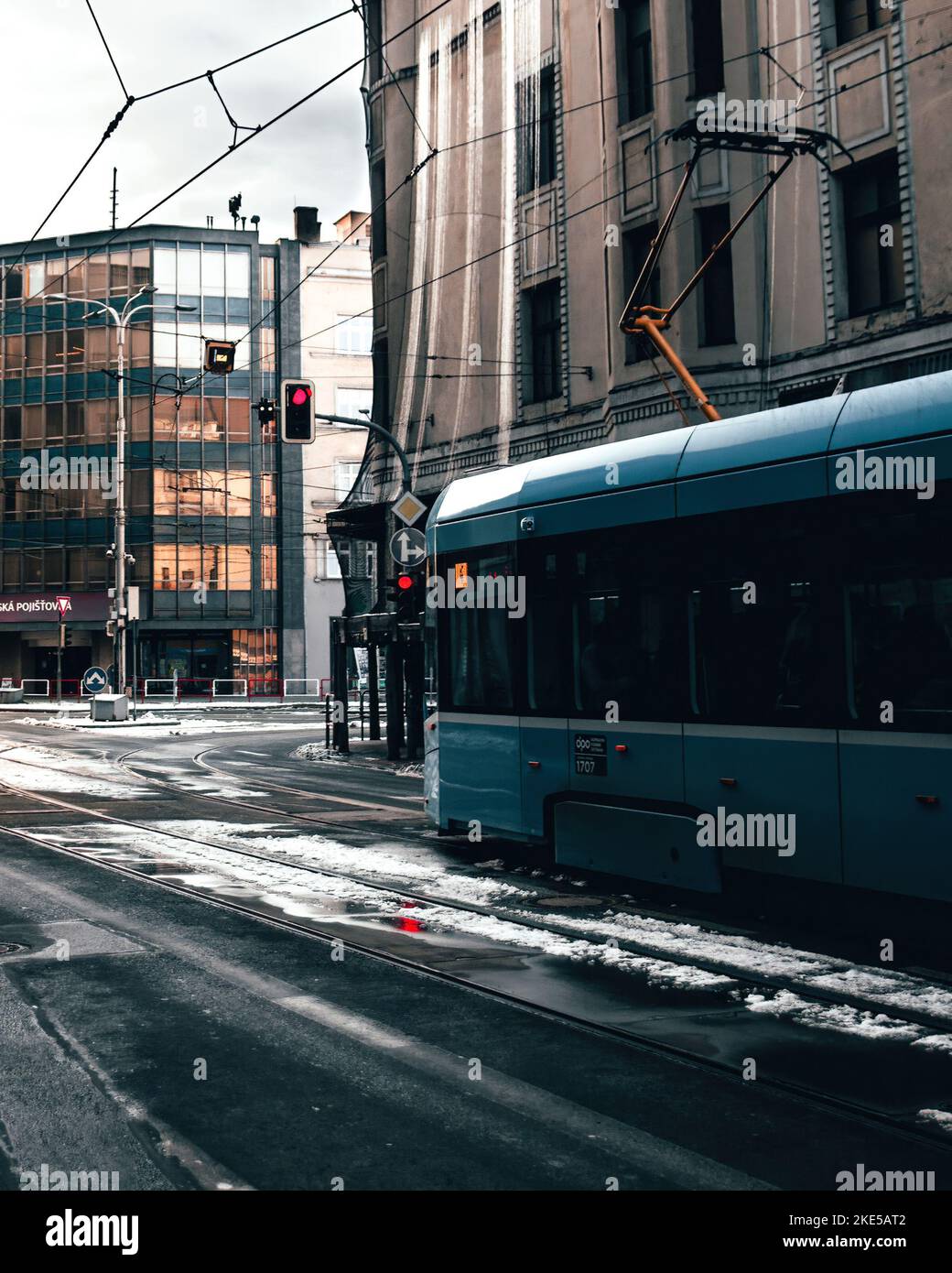 modern blue tram on tracks near tram stop in the streets of Ostrava ...