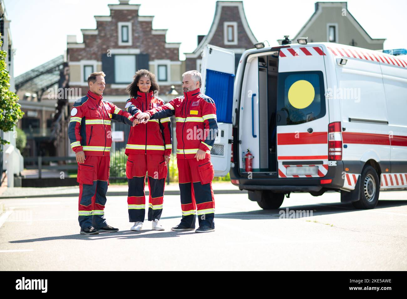 Ambulance staff demonstrating their team spirit before the camera Stock ...