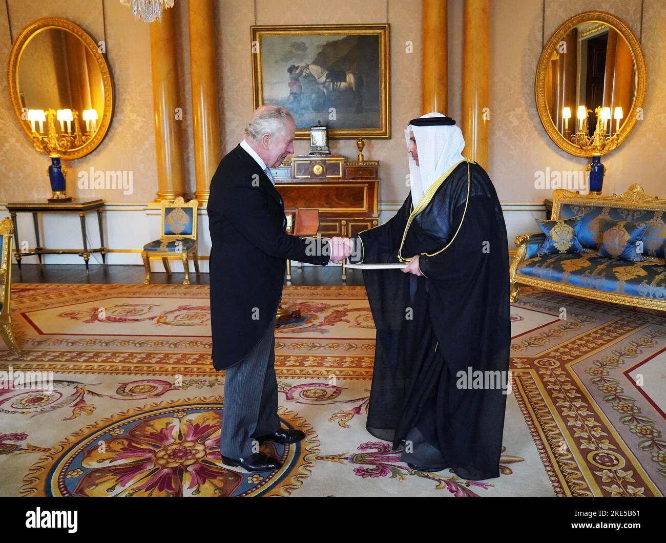King Charles III (left) receives Bader Mohammad Al Awadi (right ...