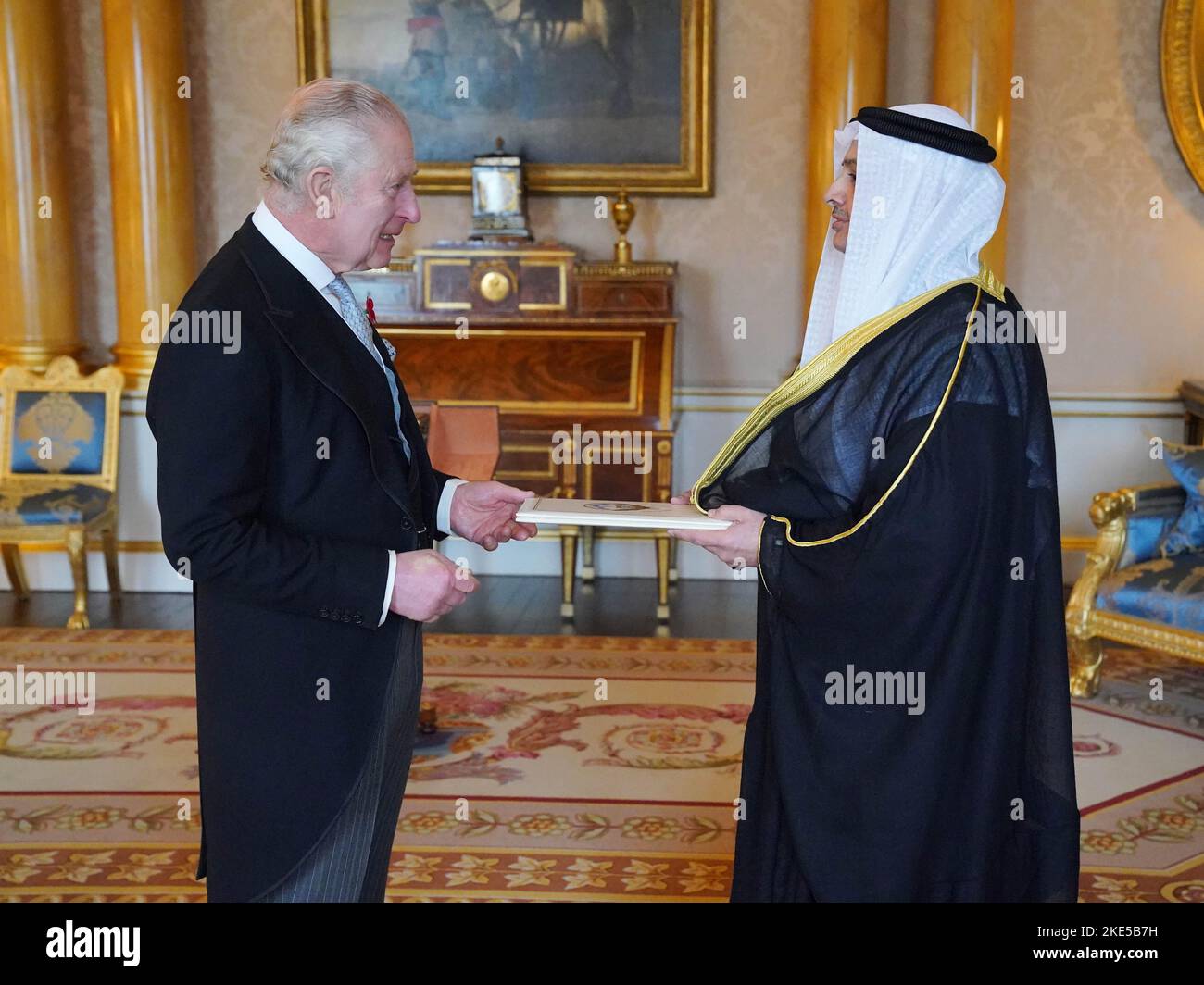 King Charles III (left) receives Bader Mohammad Al Awadi (right ...