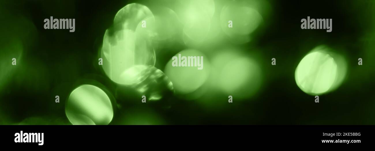 Blurred lights, green background, banner texture. Abstract bokeh with ...