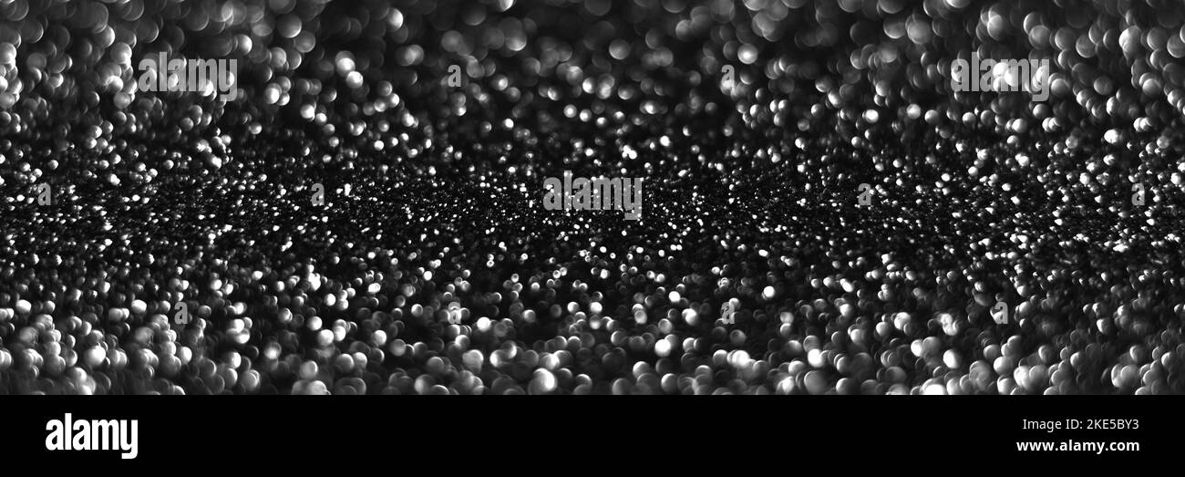 Gray black sparkling glitter bokeh background, abstract defocused ...